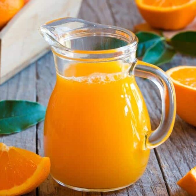 El Jugo De Naranja Botellas De Zumo De Naranja De Tropicana Foto De